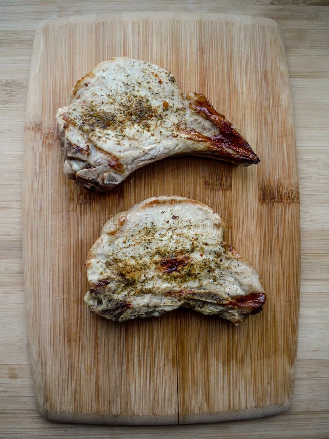 Roasted Pork Meat Steak with Quince.Delicious Fried Meat Stock Photo ...