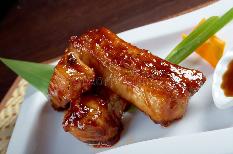 Roasted Pork Ribs in a Plate Stock Photo - Image of cooked, dinner ...