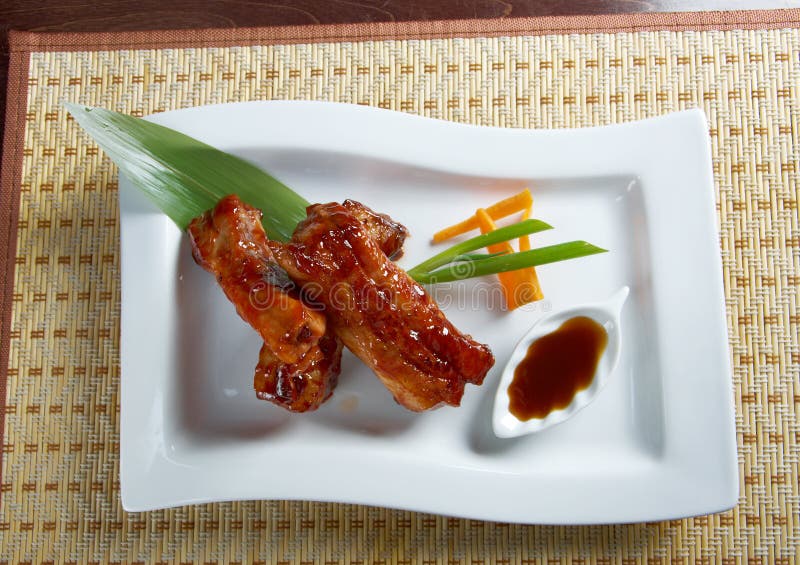 Roasted Pork Ribs in a Plate Stock Photo - Image of lunch, pork: 28185310
