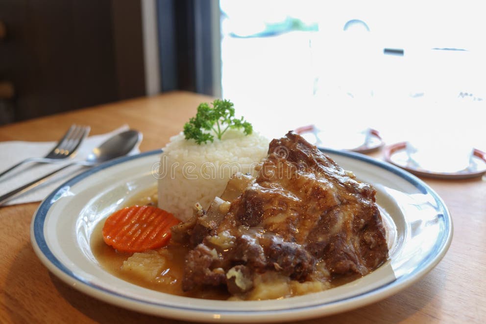 Roasted Pork Ribs with Rice Stock Image - Image of grilled, dinner ...