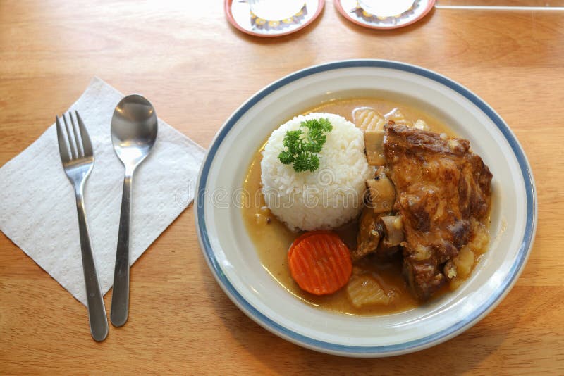 Roasted Pork Ribs with Rice Stock Photo - Image of plate, rice: 138880300