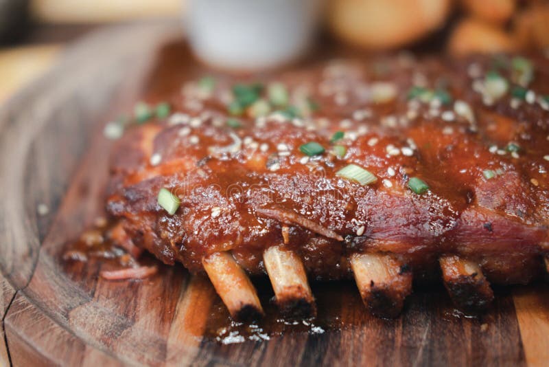 Roasted Pork Ribs on Wooden Plate Stock Image - Image of closeup, juicy ...