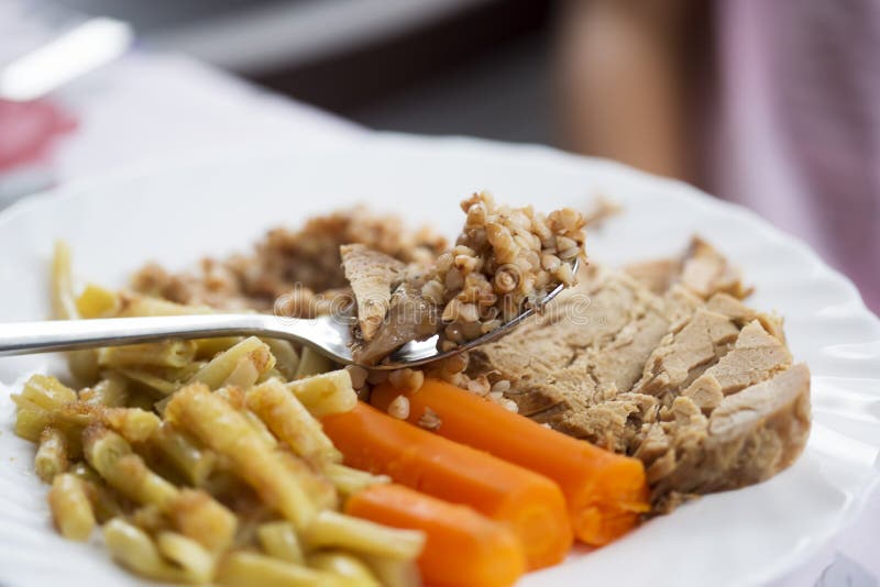 Roasted Pork Shoulder with Buckwheat, Cooked Beans and Carrots Stock ...