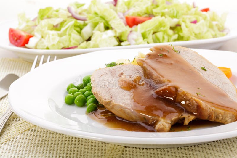 Roasted Pork Shoulder Served with Pasta and Vegetables Stock Image ...