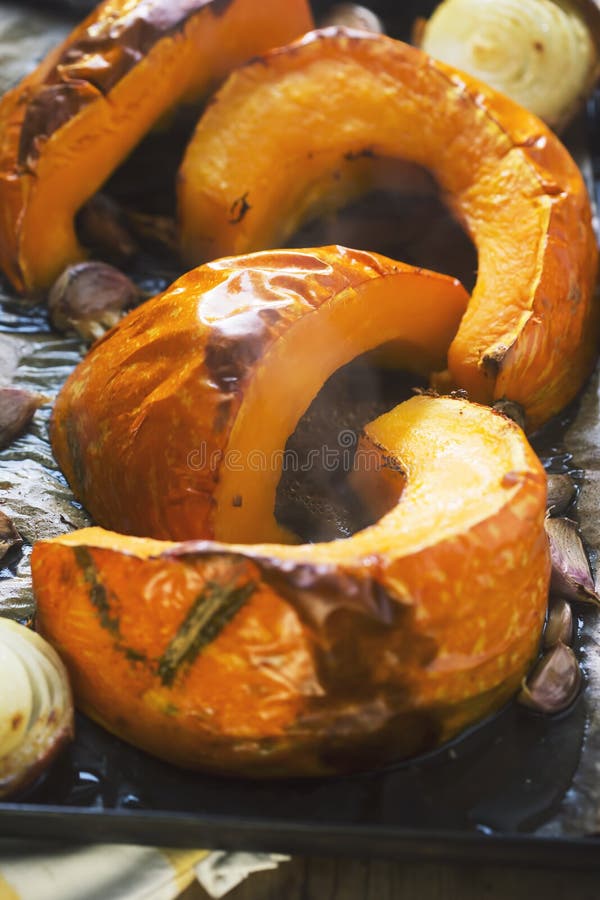 Roasted Pumpkin with Onion and Garlic on Baking Tray. Preparing Pumpkin ...