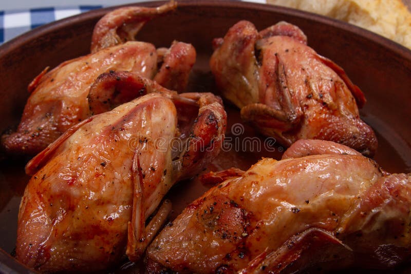 Roasted quail. Close-up stock photo. Image of clay, focus - 245850876