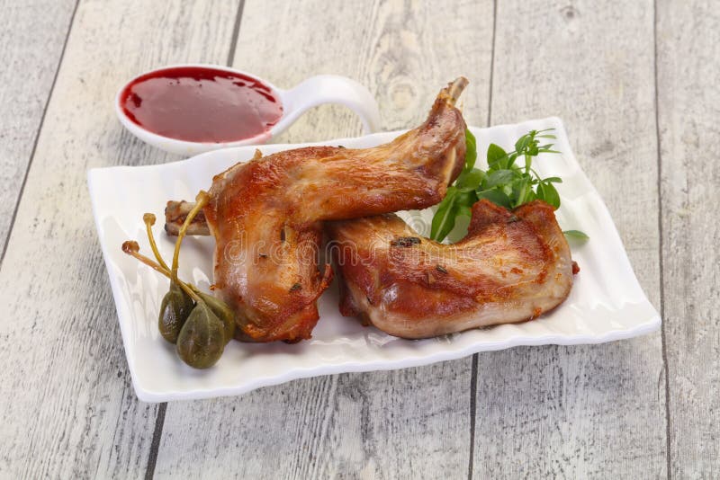 Roasted rabbit legs stock image. Image of meat, closeup - 142631205