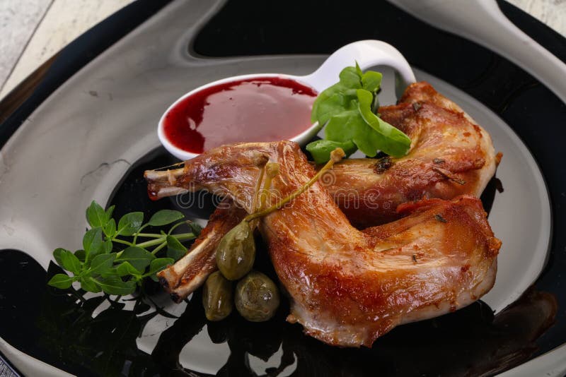 Roasted rabbit legs stock photo. Image of diet, food - 154421330
