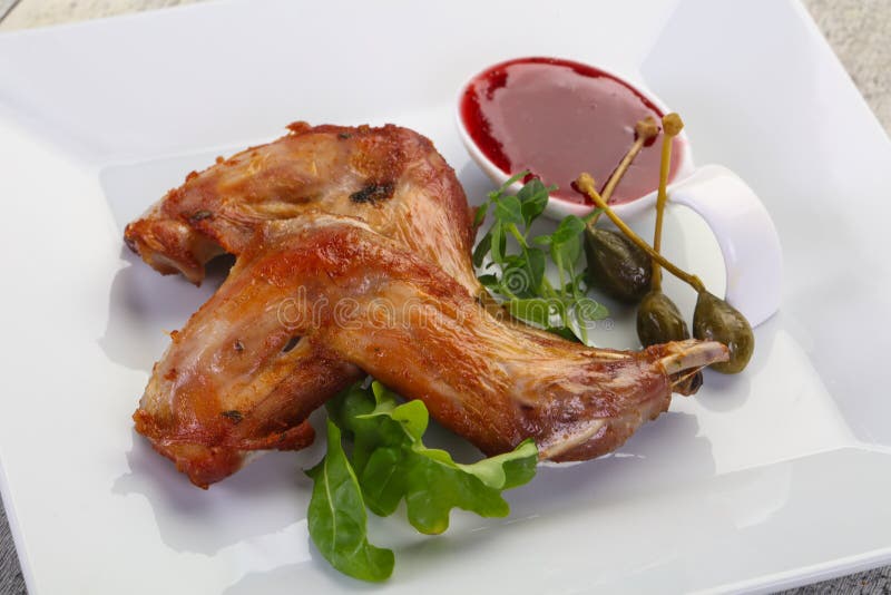 Roasted rabbit legs stock image. Image of sauce, hare - 197690105