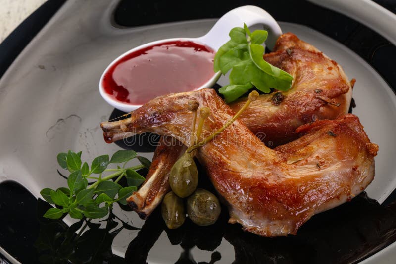 Roasted rabbit legs stock image. Image of game, diet - 197696641