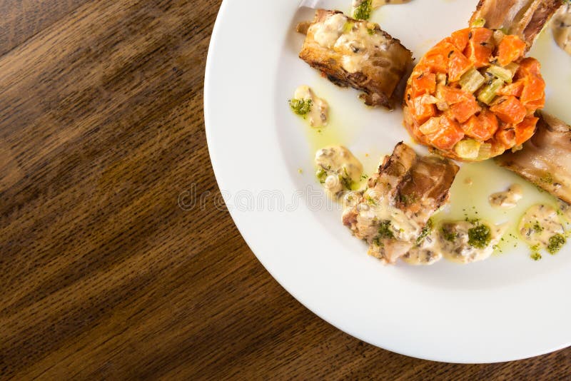 Roasted Rabbit Roulade with Carrot and Sauce Stock Photo - Image of ...