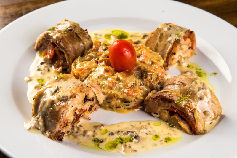 Roasted Rabbit Roulade with Carrot and Tomato Stock Image - Image of ...