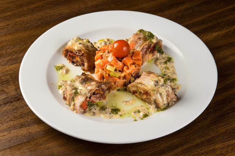Roasted Rabbit Roulade with Carrot and Tomato Stock Image - Image of ...