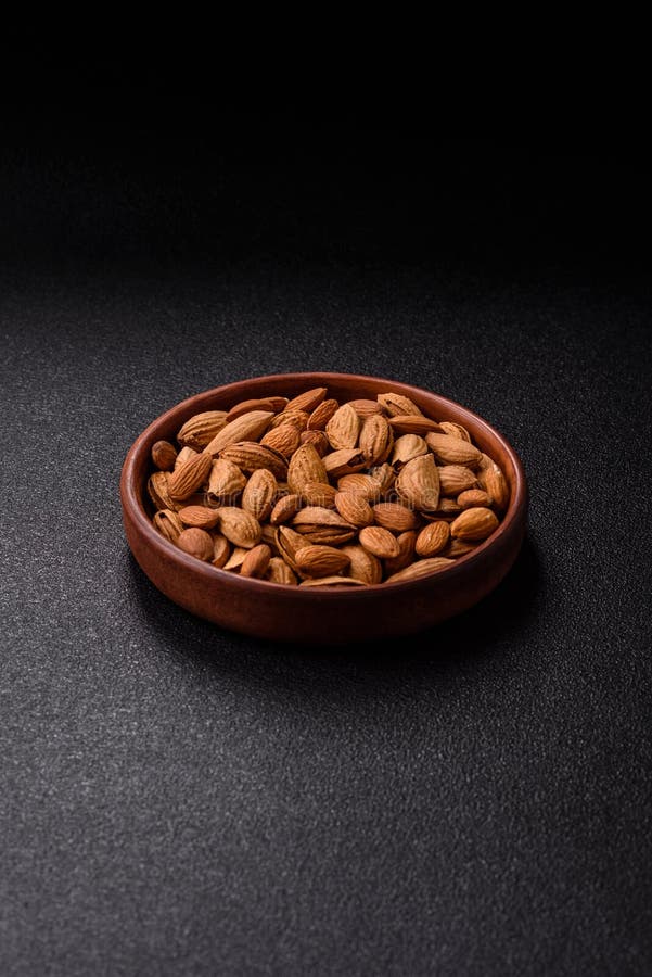 Roasted or Raw Almond Nuts in Shell in Bowl Stock Image - Image of ...