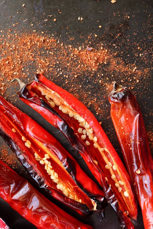 Roasted Red Chilli Peppers with Chilli Powder Stock Photo - Image of ...