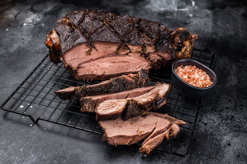 Roasted Roe Deer Leg. Slow Cooked Game Meat of Venison with Bone. Black ...