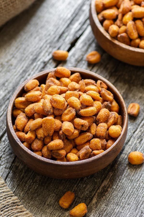 Roasted Salted Corn Nuts with Spice and Sauce in Bowl Stock Photo ...