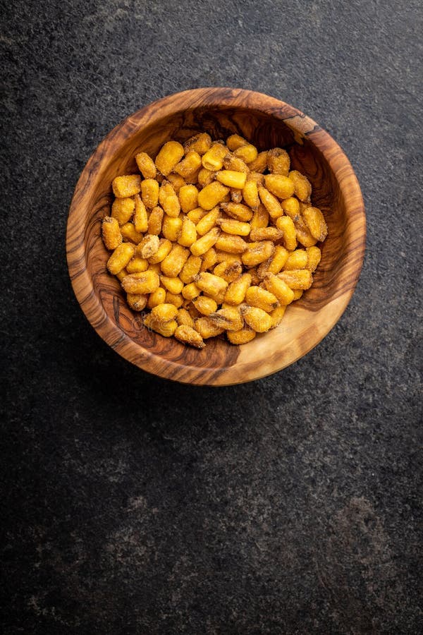 Roasted Salted Corn Snack in Bowl on Black Table Stock Photo - Image of ...