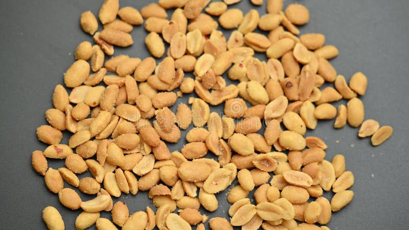 Roasted salted peanuts stock video. Video of turning - 326208355