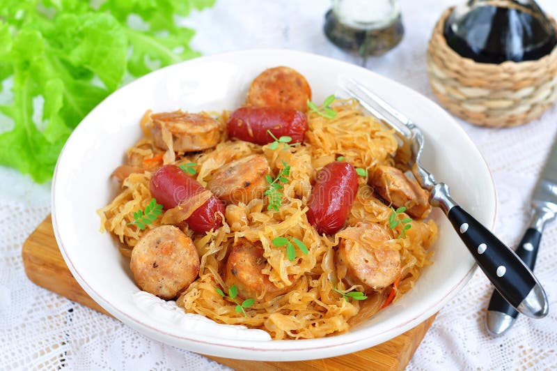 Roasted Sausages with Stewed Cabbage Stock Image - Image of roasted ...