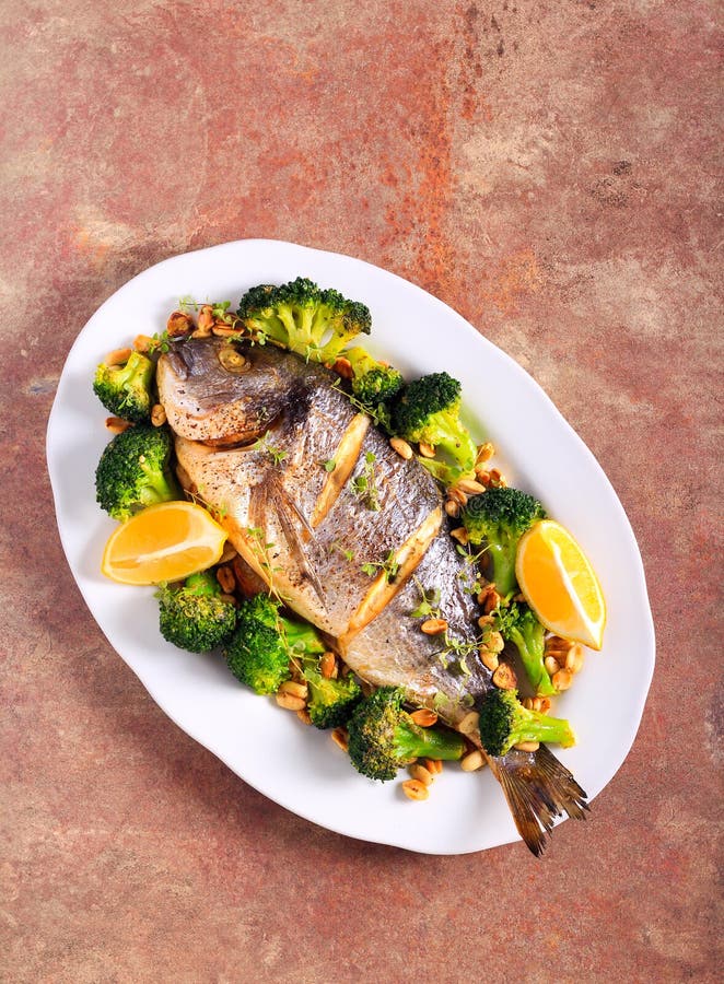 Roasted Sea Bream and Charred Broccoli Stock Photo - Image of fish ...