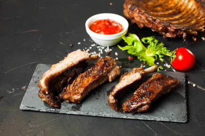 Roasted Barbecue Pork Ribs on the Black Stock Image - Image of ...