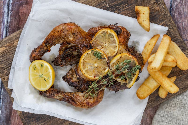 Roasted spatchcock poussin stock image. Image of thyme - 361267251