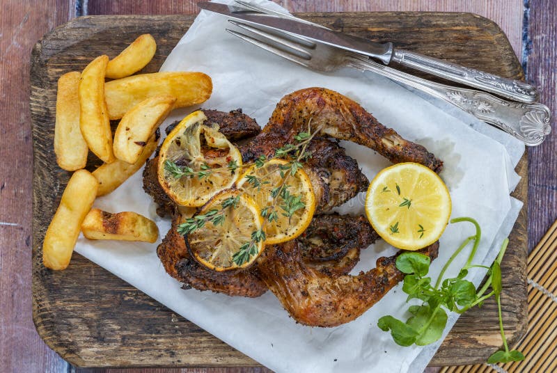 Roasted spatchcock poussin stock photo. Image of skin - 361267598