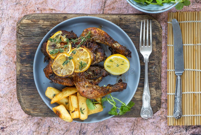 Roasted spatchcock poussin stock photo. Image of board - 361267374