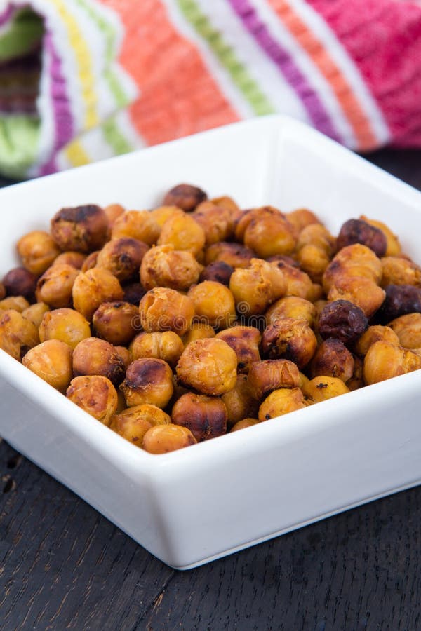 Roasted Chick Peas Healthy Snack on Wooden Table Stock Photo - Image of ...