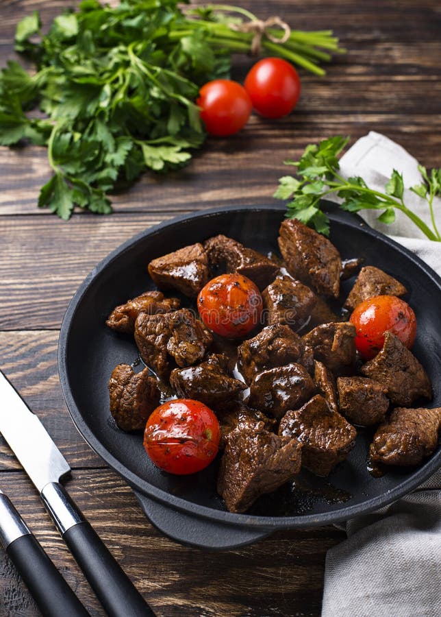 Roasted or Stewed Beef Meat with Tomato Stock Image - Image of ragout ...