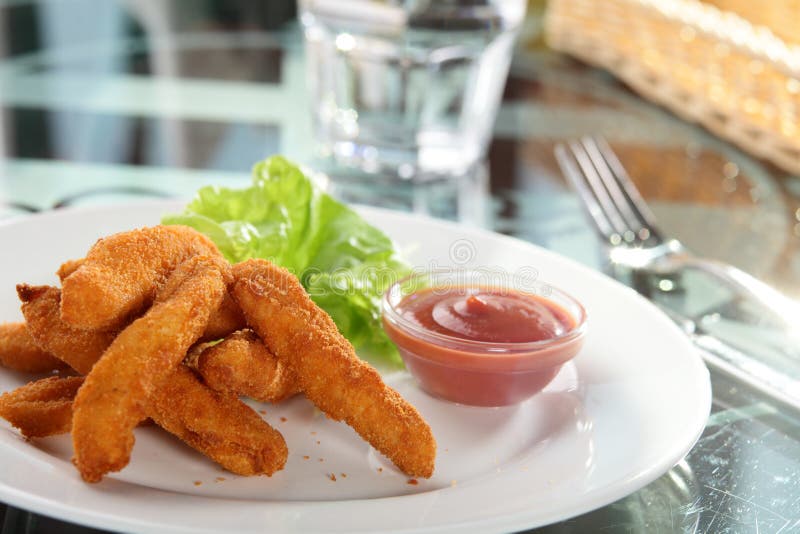 Roasted sticks from potato stock photo. Image of piece - 30858358