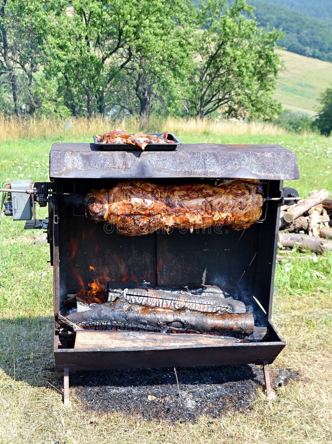 Suckling Pig Rotating Spit Stock Photos - Free & Royalty-Free Stock ...