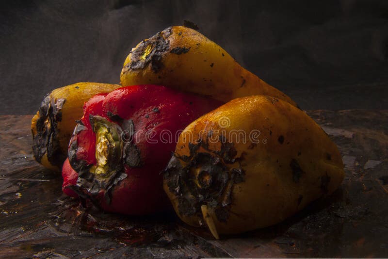 Roasted Sweet Peppers: Red and Yellow on a Dark Background Stock Photo ...