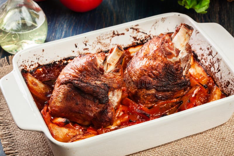 Roasted Turkey Knuckle with Potatoes and Vegetable Stock Photo - Image ...