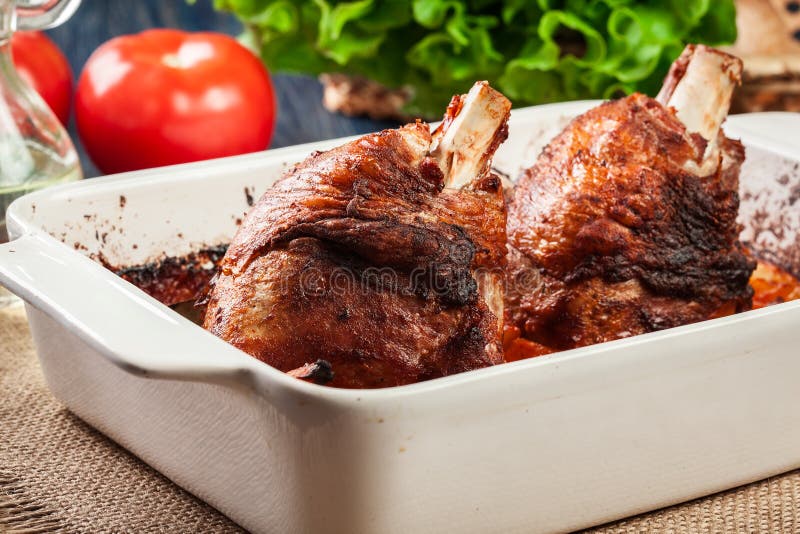 Roasted Turkey Knuckle with Potatoes and Vegetable Stock Photo - Image ...