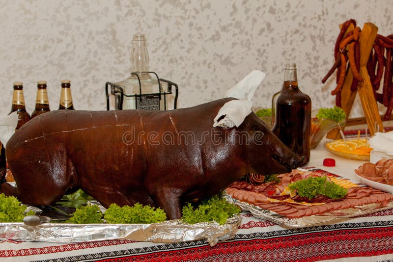 Roasted Whole Pig on Table. Side View Stock Image - Image of dinner ...