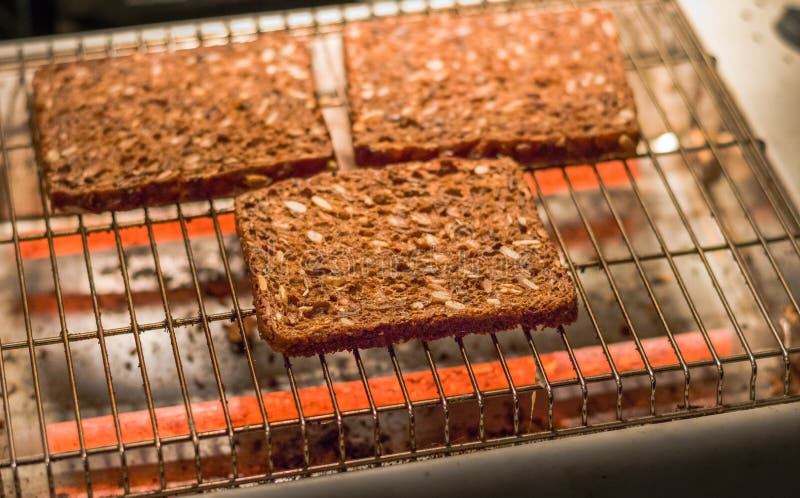 Roasting bread on toaster stock image. Image of delicious - 113175303
