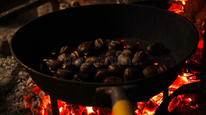 Roasting Chestnuts in a Pan Over Fire Stock Image - Image of chestnut ...