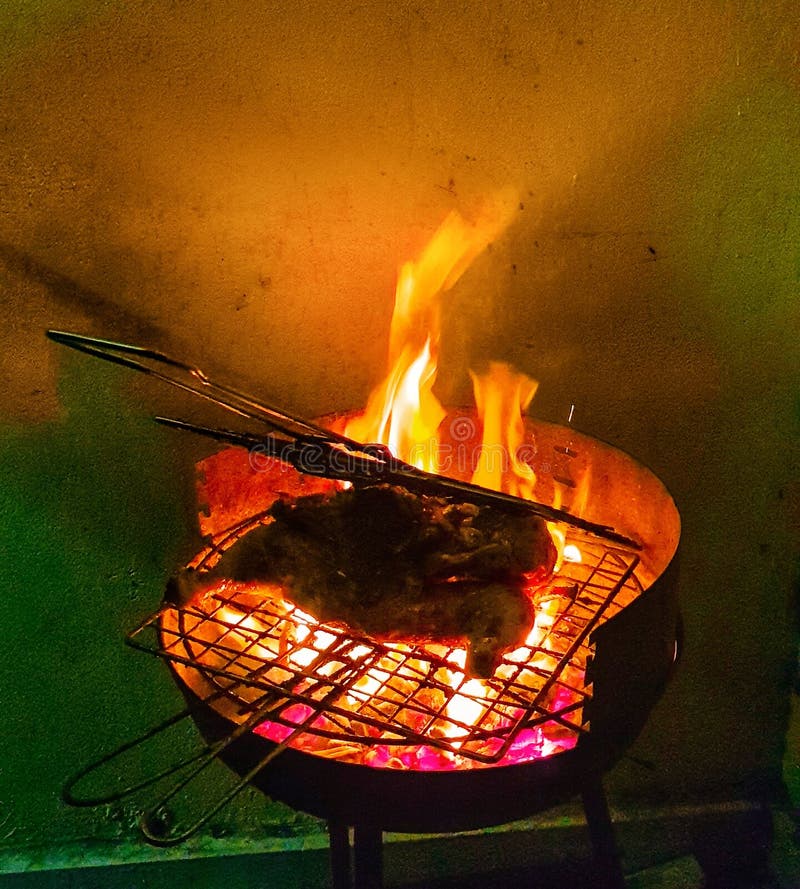 Roasting a Chicken on the Grill Full of Fire Stock Image - Image of ...