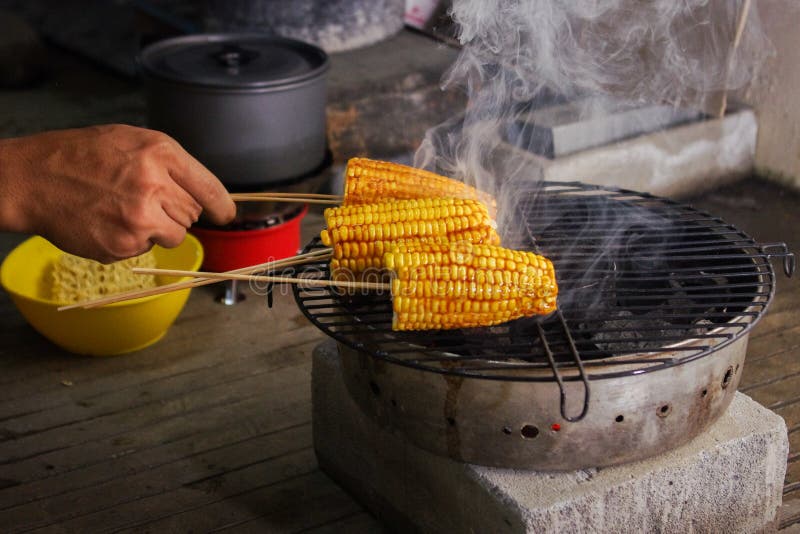 Roasting corn on the grill stock photo. Image of barbeque - 262155390