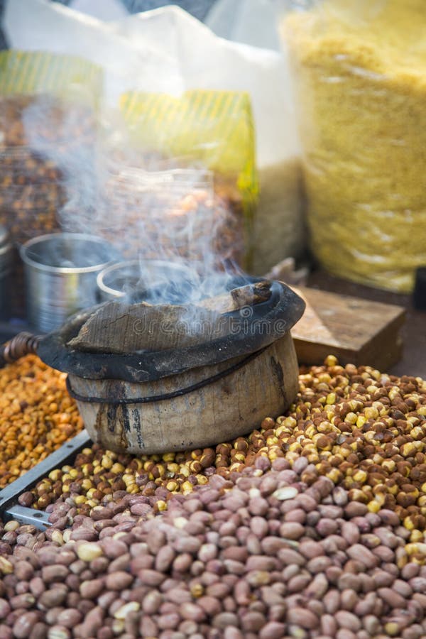 Roasting Hazelnuts and Peanuts at Market Stock Photo - Image of pile ...