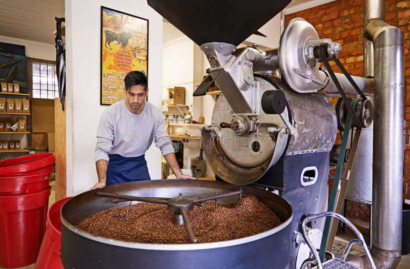 Roasting for Maximum Flavour. Coffee Production. Stock Photo - Image of ...