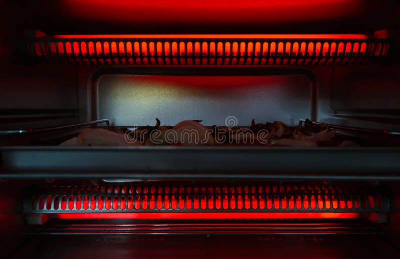 Roasting Meat in a Mini Oven Stock Image - Image of light, mini: 254247293