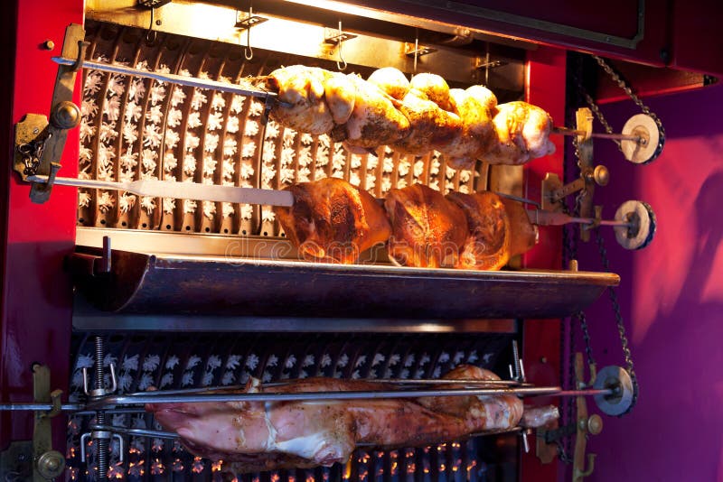Roasting meat on spit stock image. Image of spitroast - 30371605