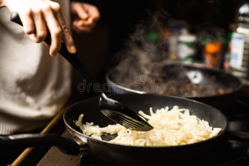 Roasting Onions. Chopped Onions are Fried in a Pan Stock Photo - Image ...