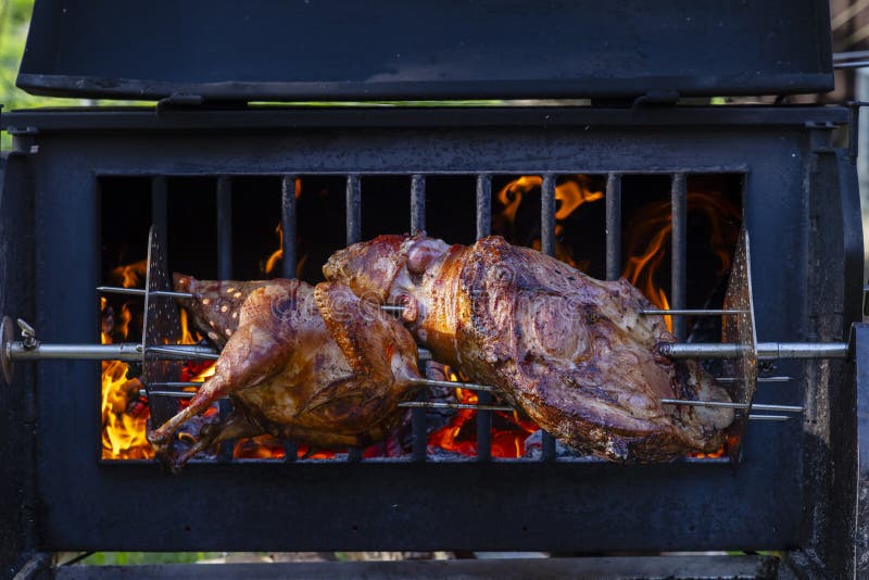 Roasting Pork and Turkey on Spit Stock Image - Image of barbecue, east ...