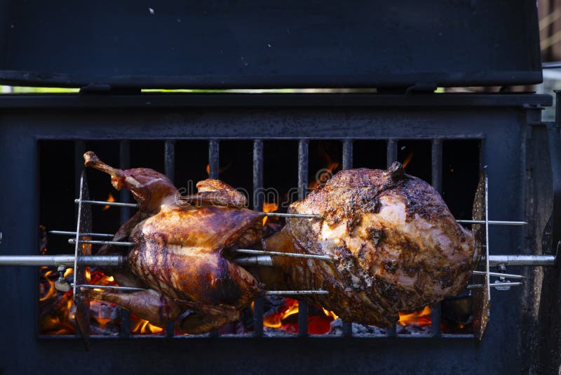 Roasting Pork and Turkey on Spit Stock Image - Image of food, cook ...