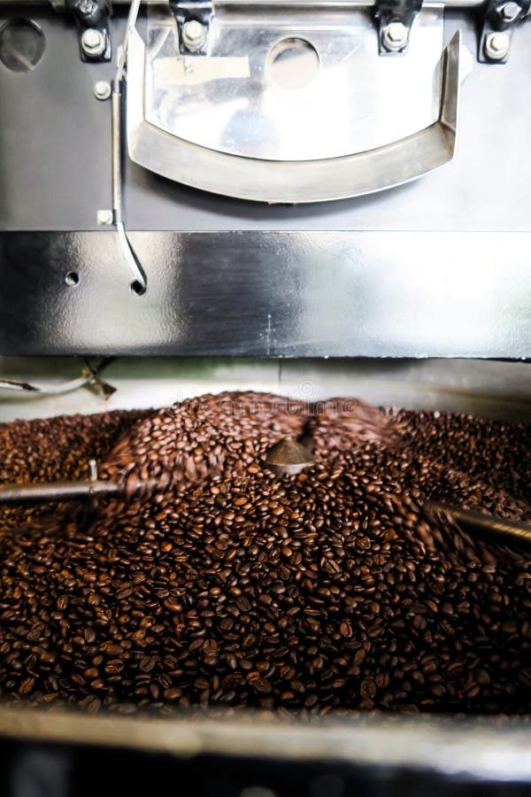 Roasting process of coffee stock photo. Image of manufacturing - 250093358