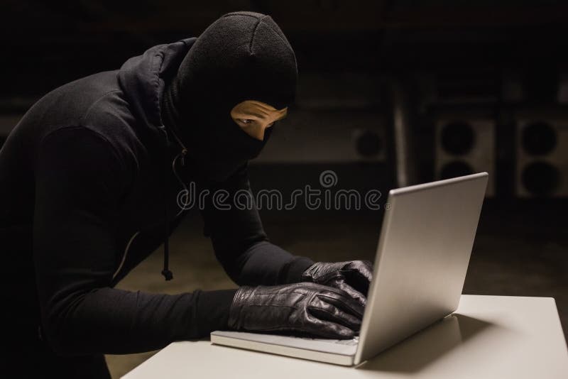 Robber With Laptop Trying To Open The Vault Door Stock Image - Image of ...